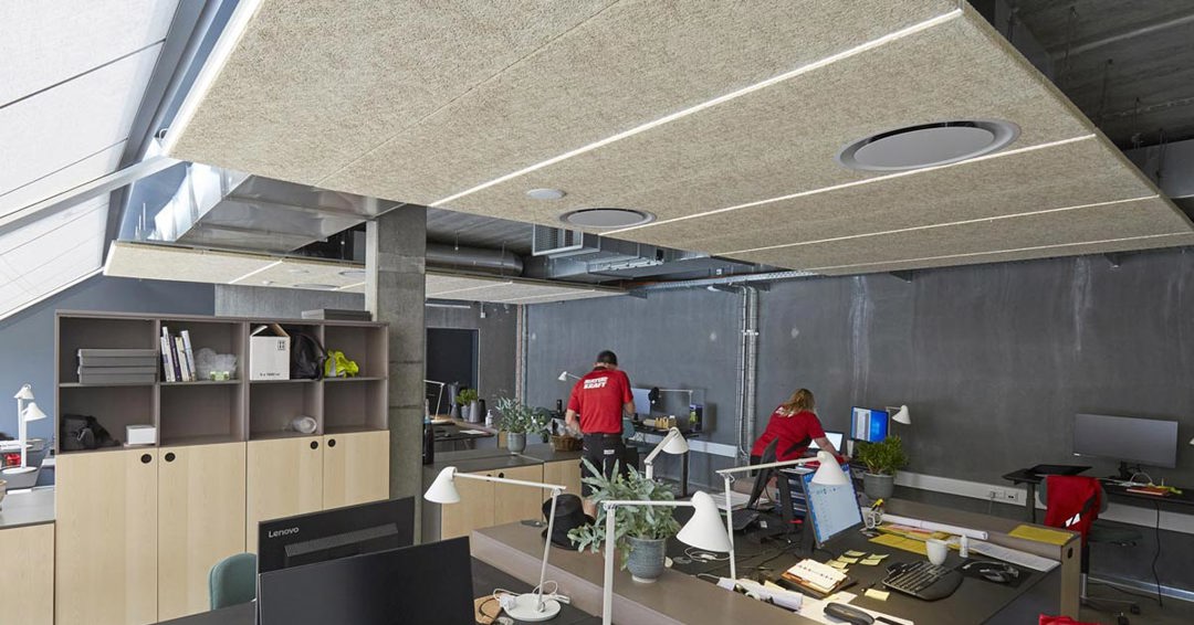 Sound absorption with floating acoustic clouds | Troldtekt